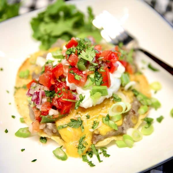 Easy Bean and Cheese Tostada Recipe - Miss in the Kitchen